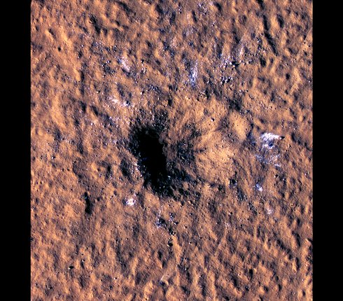 HiRISE Views a Mars Impact Crater Surrounded by Water Ice