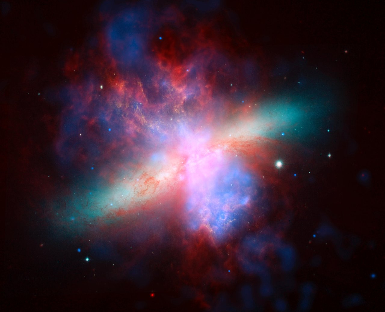 Great Observatories Present Rainbow of a Galaxy