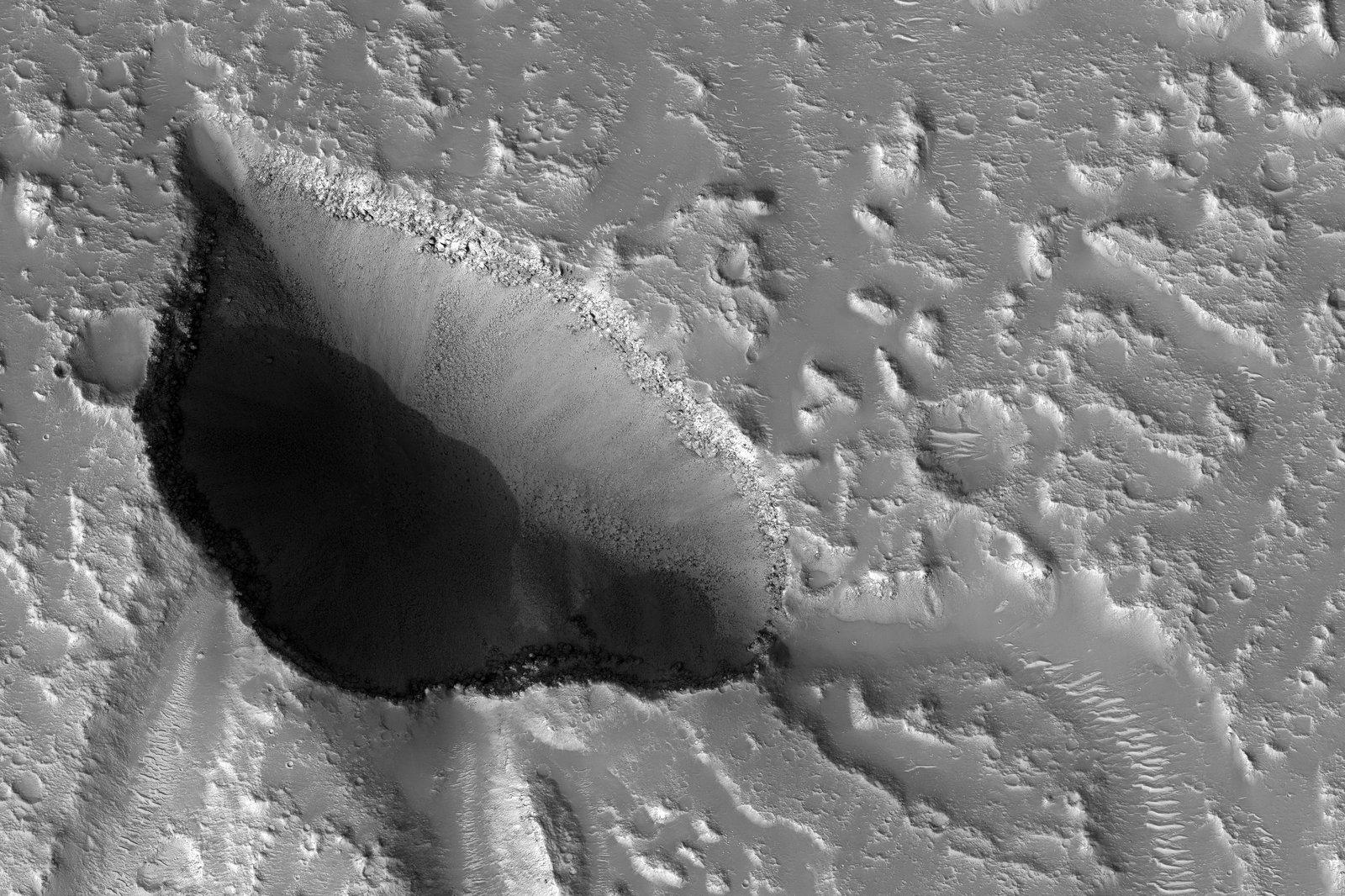 Pits and Channels of Hebrus Valles
